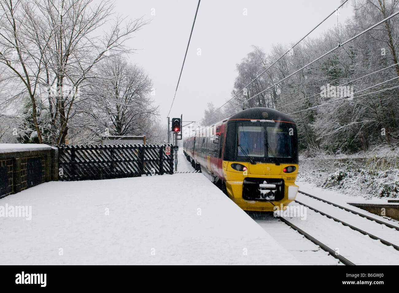 A morning train arrives at the railway station after an overnight ...