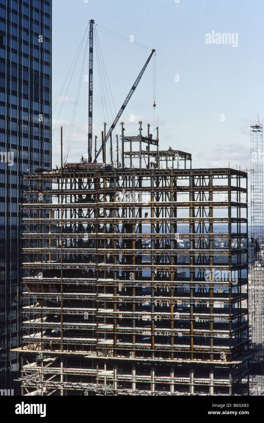 High Rise Building under construction, steel workers, walking on steel ...