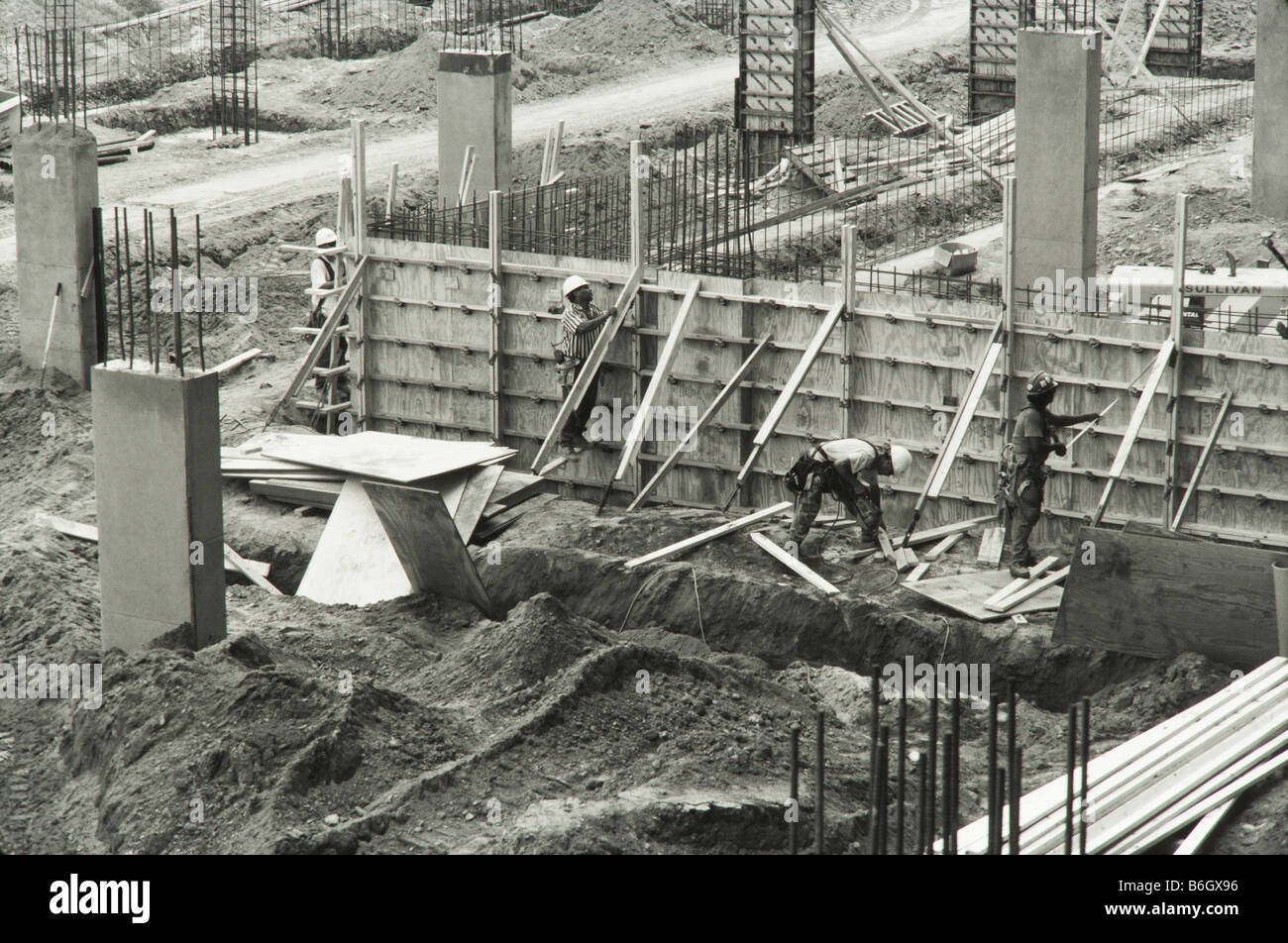High Rise Building under construction, workers, pouring concrete ...