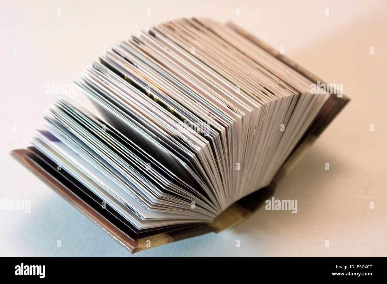 Very small pocket book isolated on white Stock Photo - Alamy