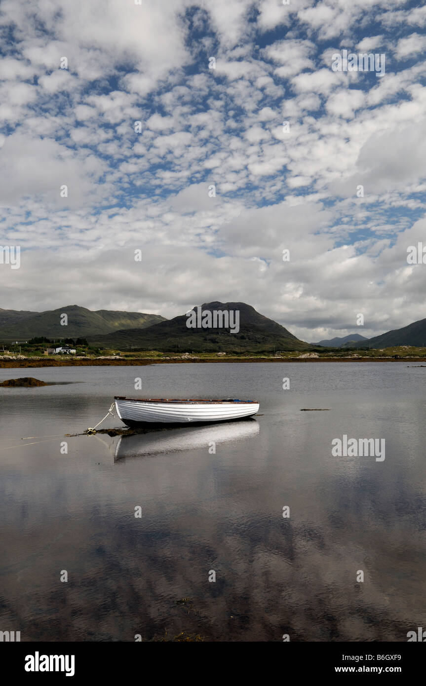 Connemara white fishing boat row rowing ballynakill harbour reflection ...