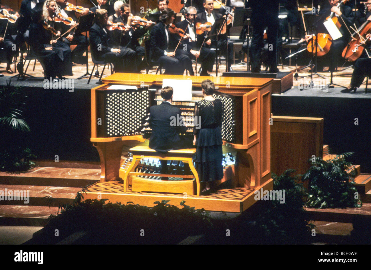 Organist plays at console of huge organ of the Crystal Cathedal, Garden ...