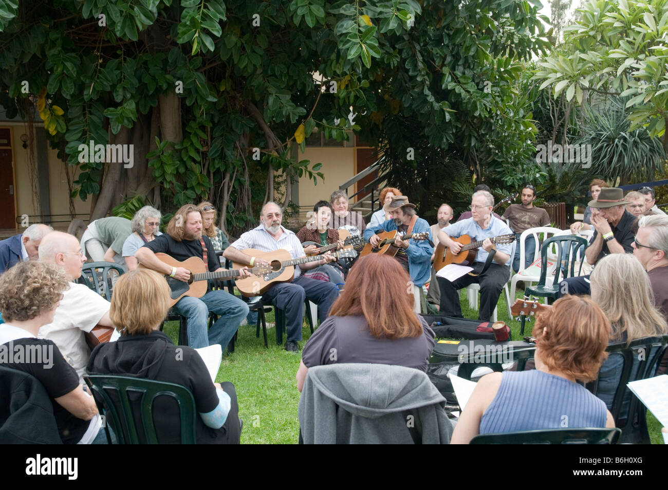 Community singing hi-res stock photography and images - Alamy