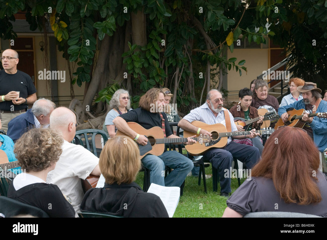 Israel Nof Ginosar Community singing Stock Photo - Alamy
