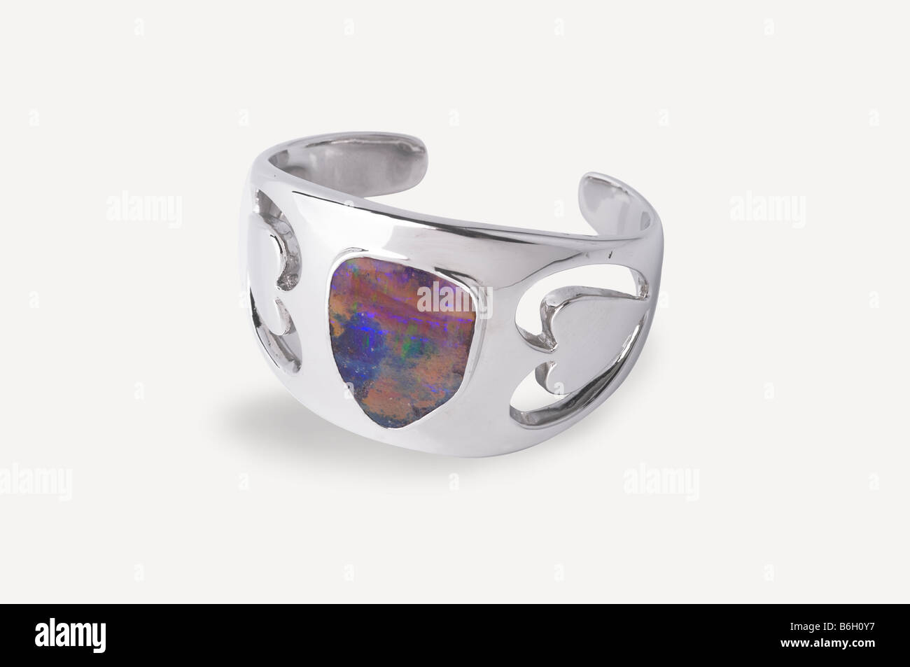 Opal and silver bangle on white background Stock Photo - Alamy