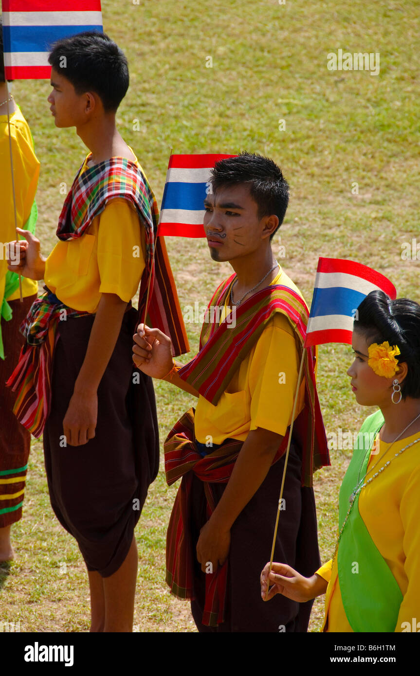 dancers with flags at the Surin Elephant Festival in Thailand Stock ...