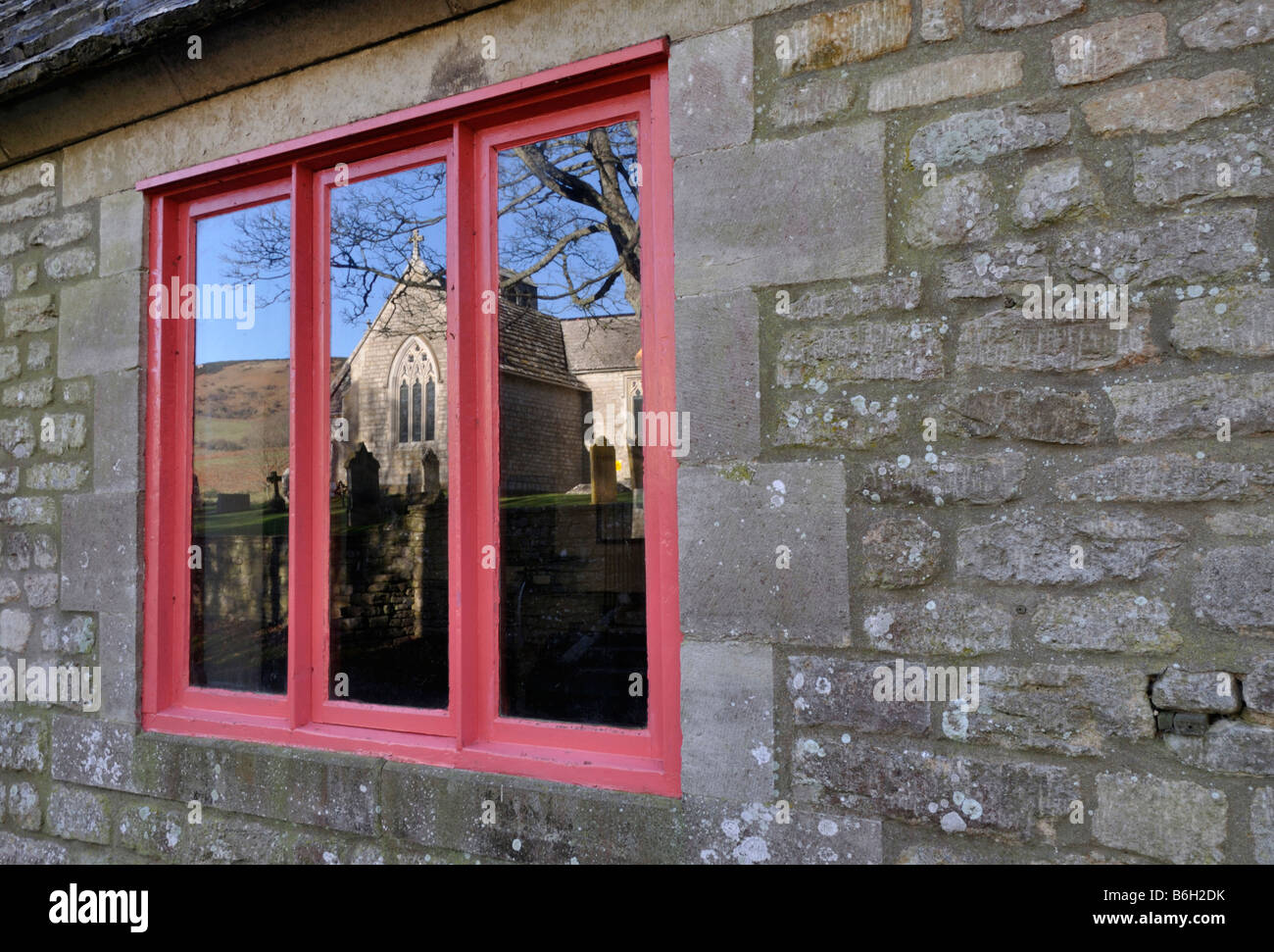 Reflection of church in window Tyneham Dorset Stock Photo - Alamy