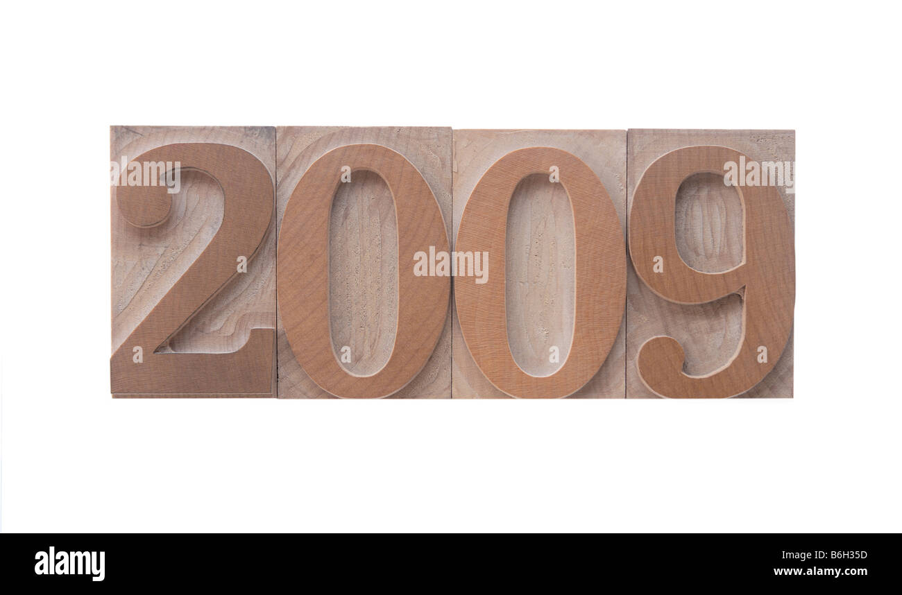the numbers '2009' in old ink-stained wood type Stock Photo - Alamy
