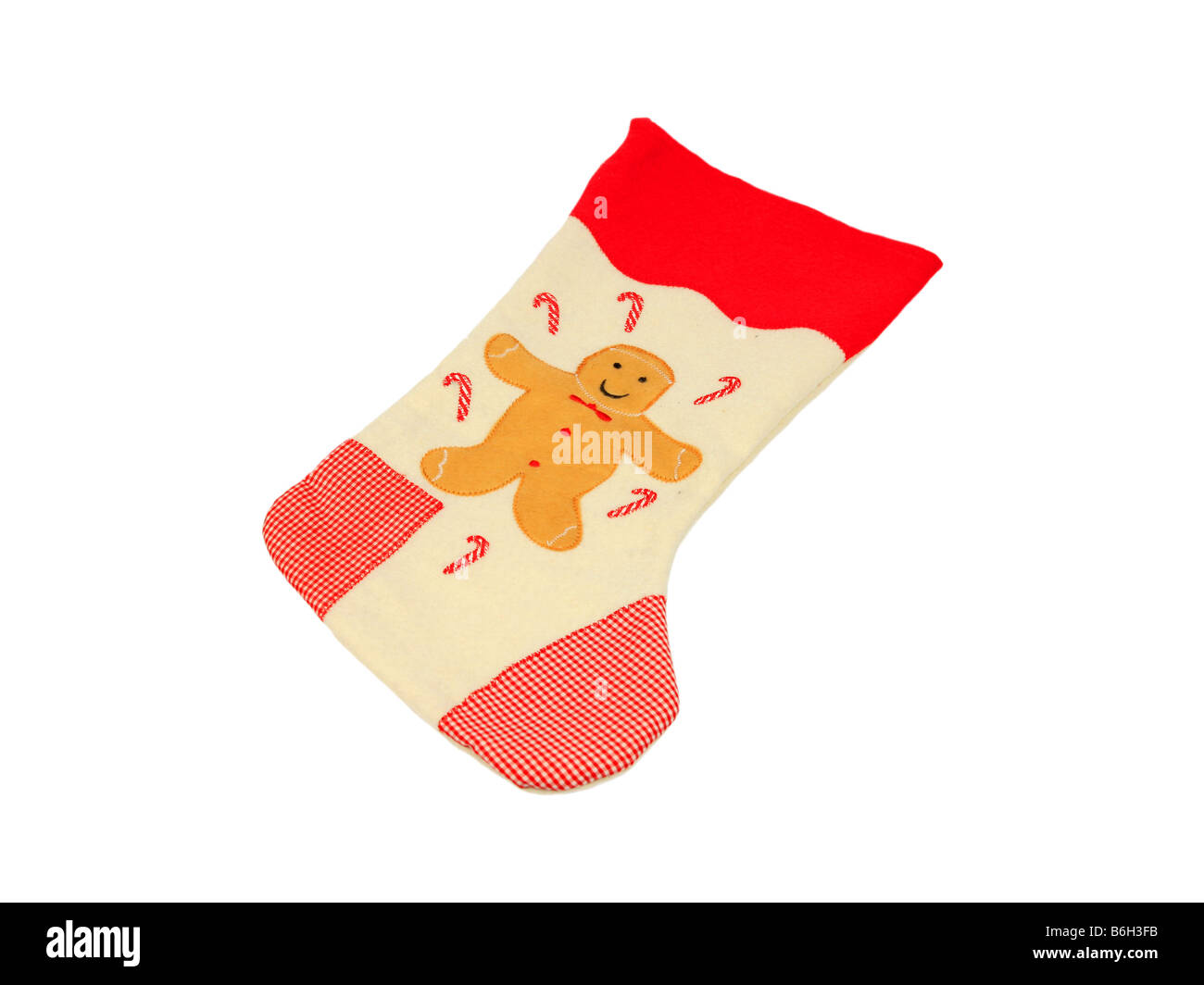 Santa Christmas Stocking with a gingerbread man motif Stock Photo - Alamy