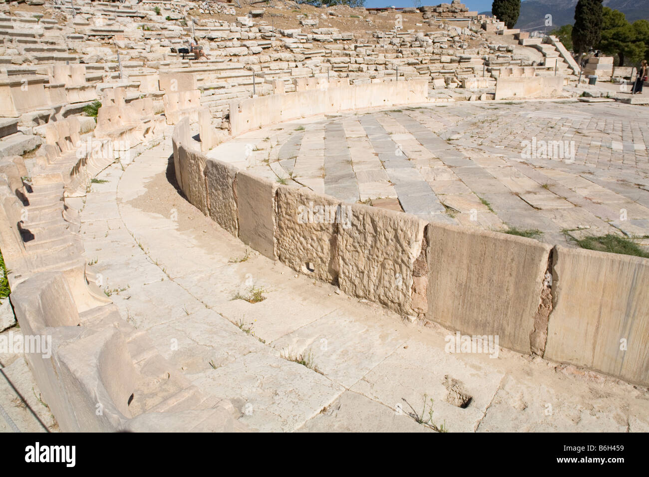 Ancient marble seats at the theatre of Dionysus at the Acropolis in ...