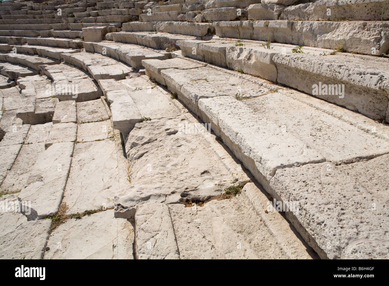 Ancient marble seats at the theatre of Dionysus at the Acropolis in ...