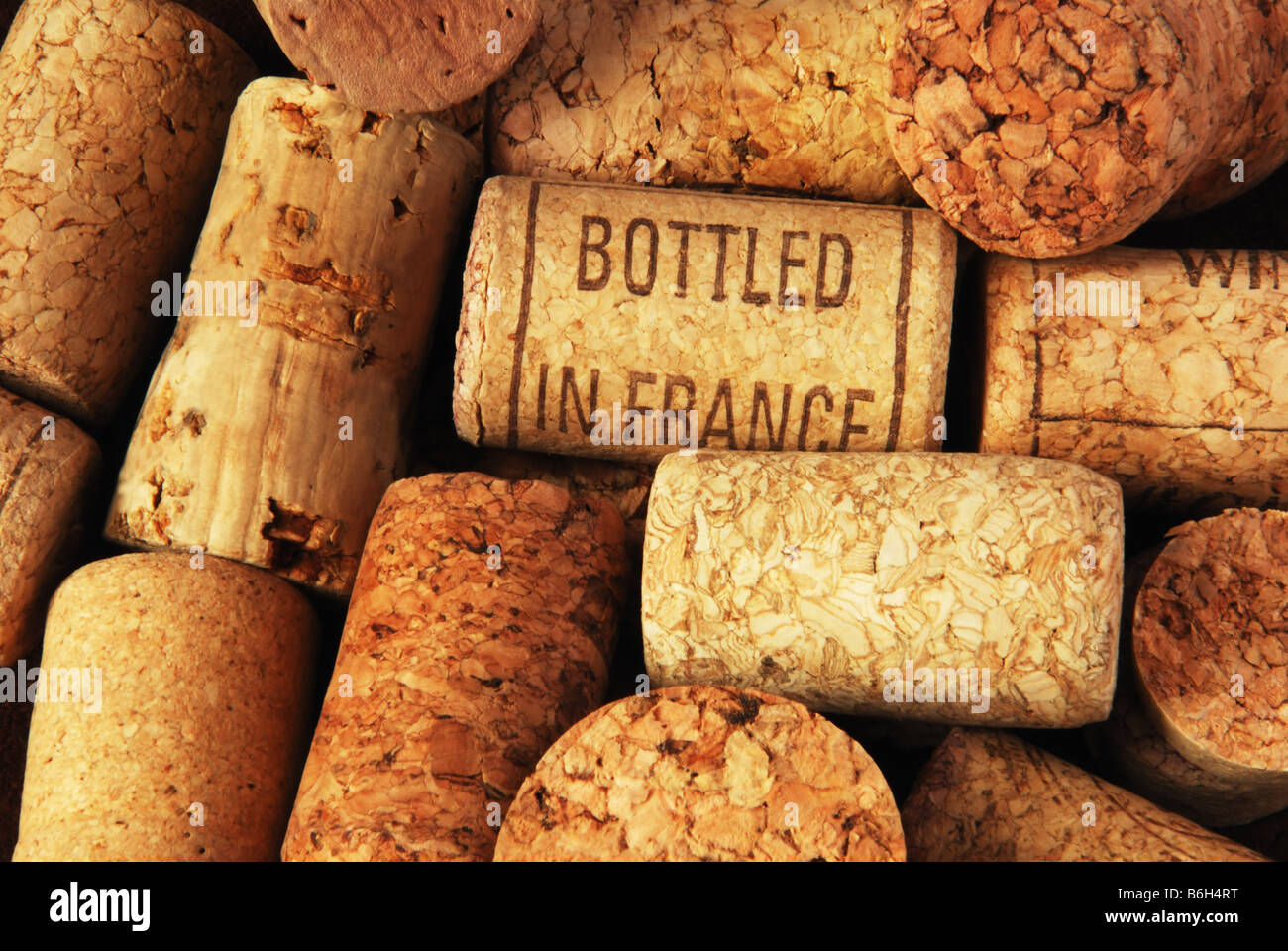 heap of wine bottle corks one of them with inscription bottled in ...