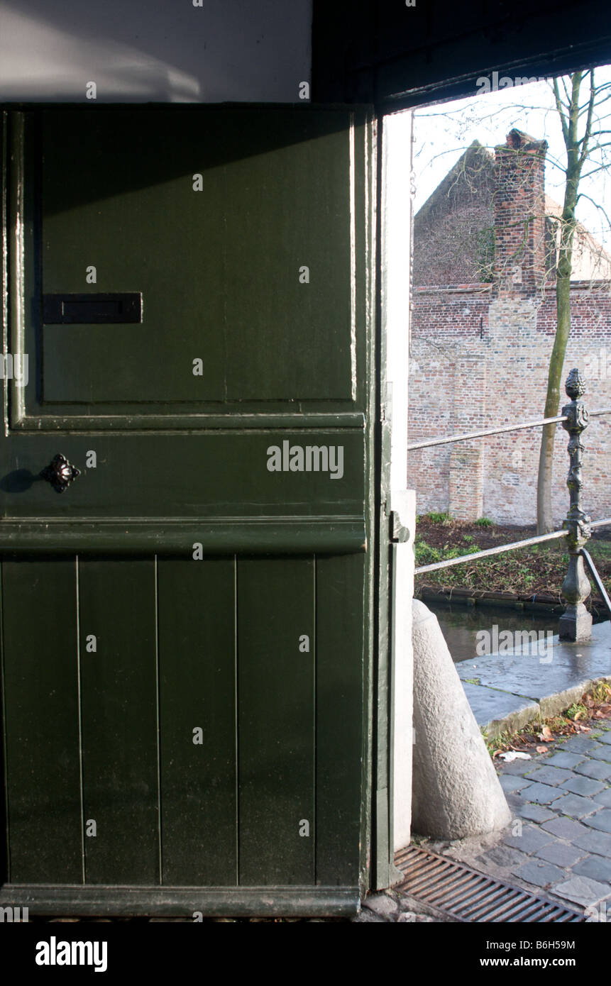 A door in the Main Entrance Gate of the Bruges Beguinage Stock Photo ...