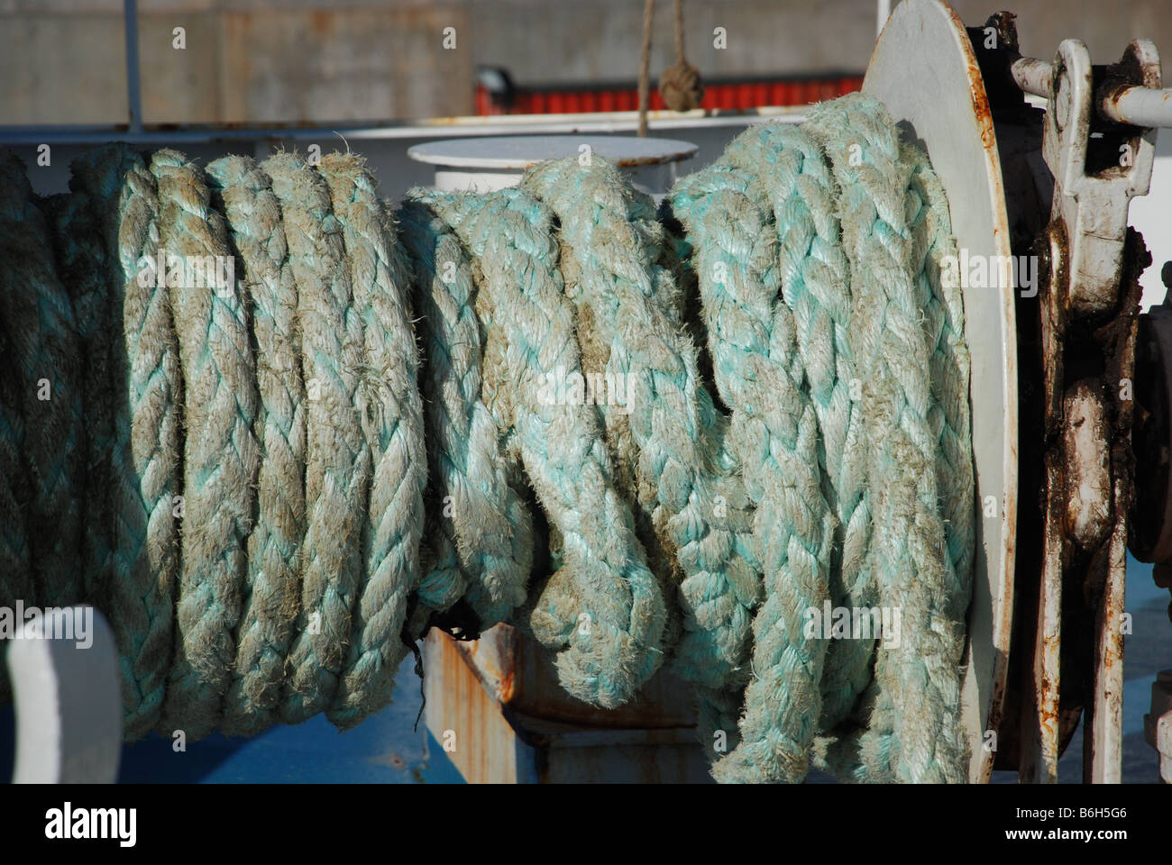 Coiled rope on a boat Stock Photo - Alamy