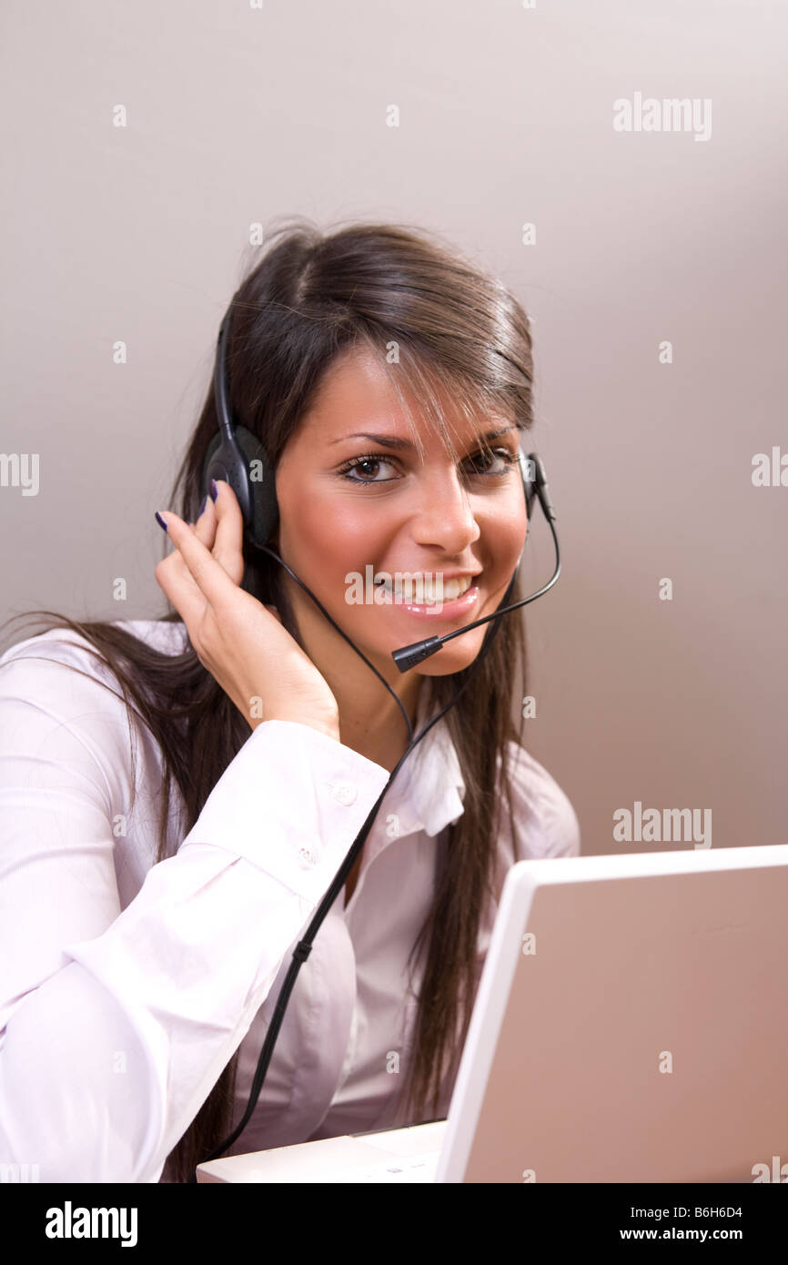 Friendly customers service employee Stock Photo - Alamy