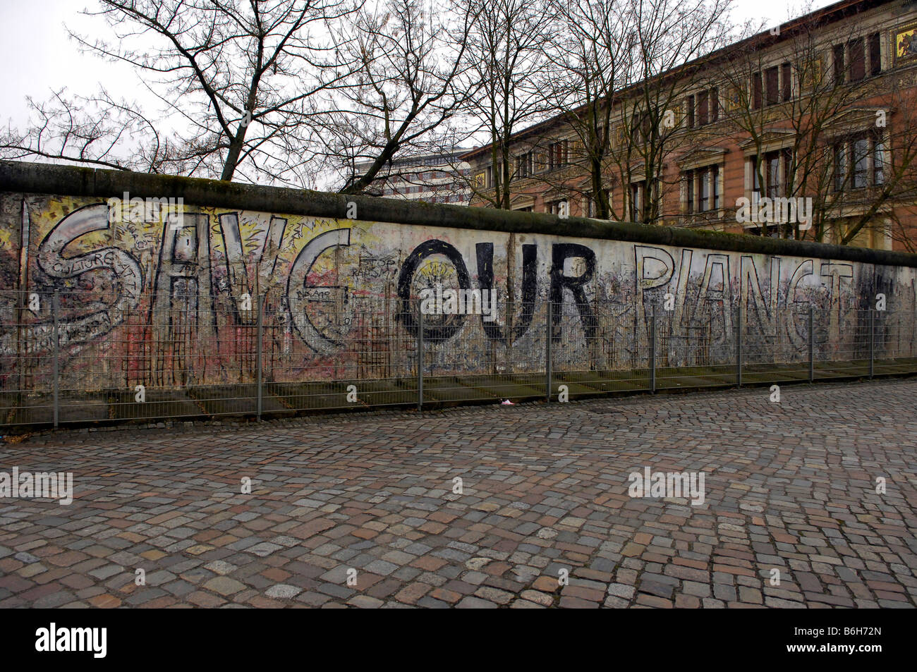 save our planet eco graffiti berlin wall niederkirchnerstraße Stock ...