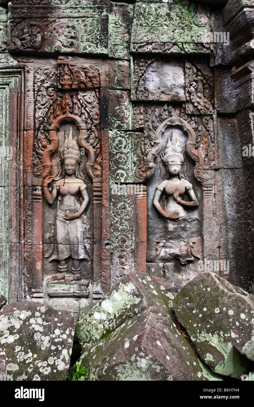 Two female human figures bas relief inside beautiful Ta Prohm temple ...