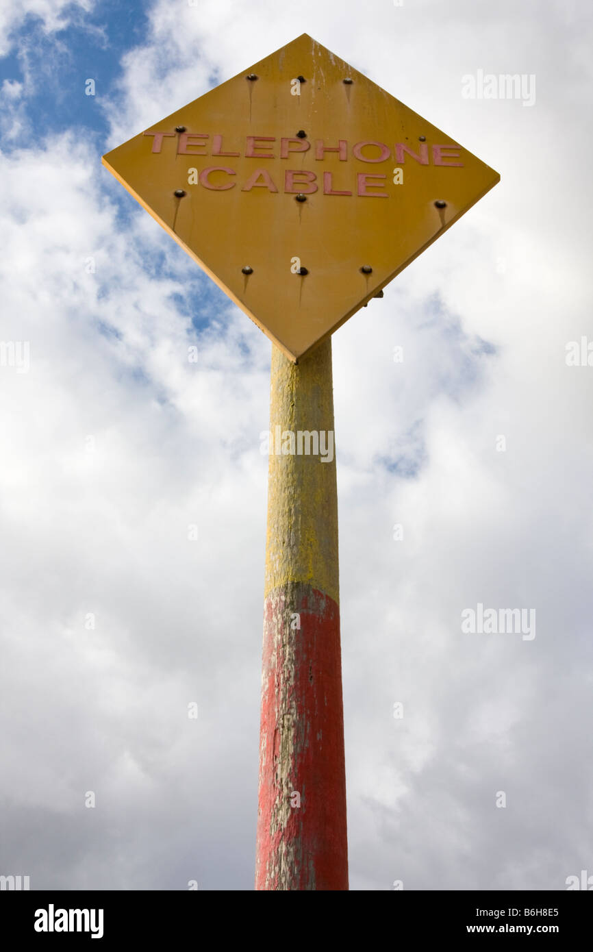 Sign warning of Telephone cable below on Aldeburgh beach Stock Photo ...