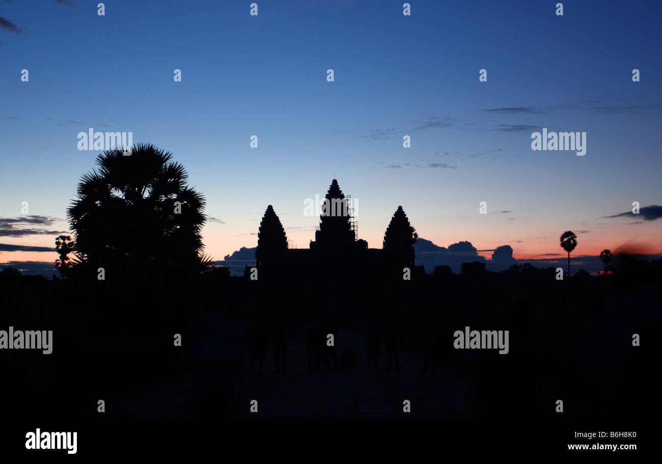 Black shape of Angkor Wat temple taken before Sunrise with a clear blue ...