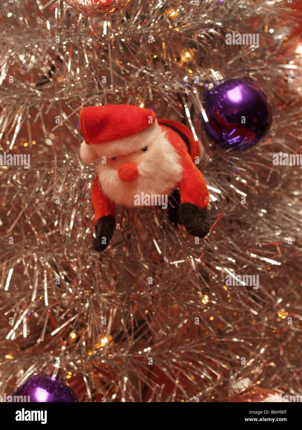 Santa Claus next to a bubble in a plastic christmas tree Stock Photo ...
