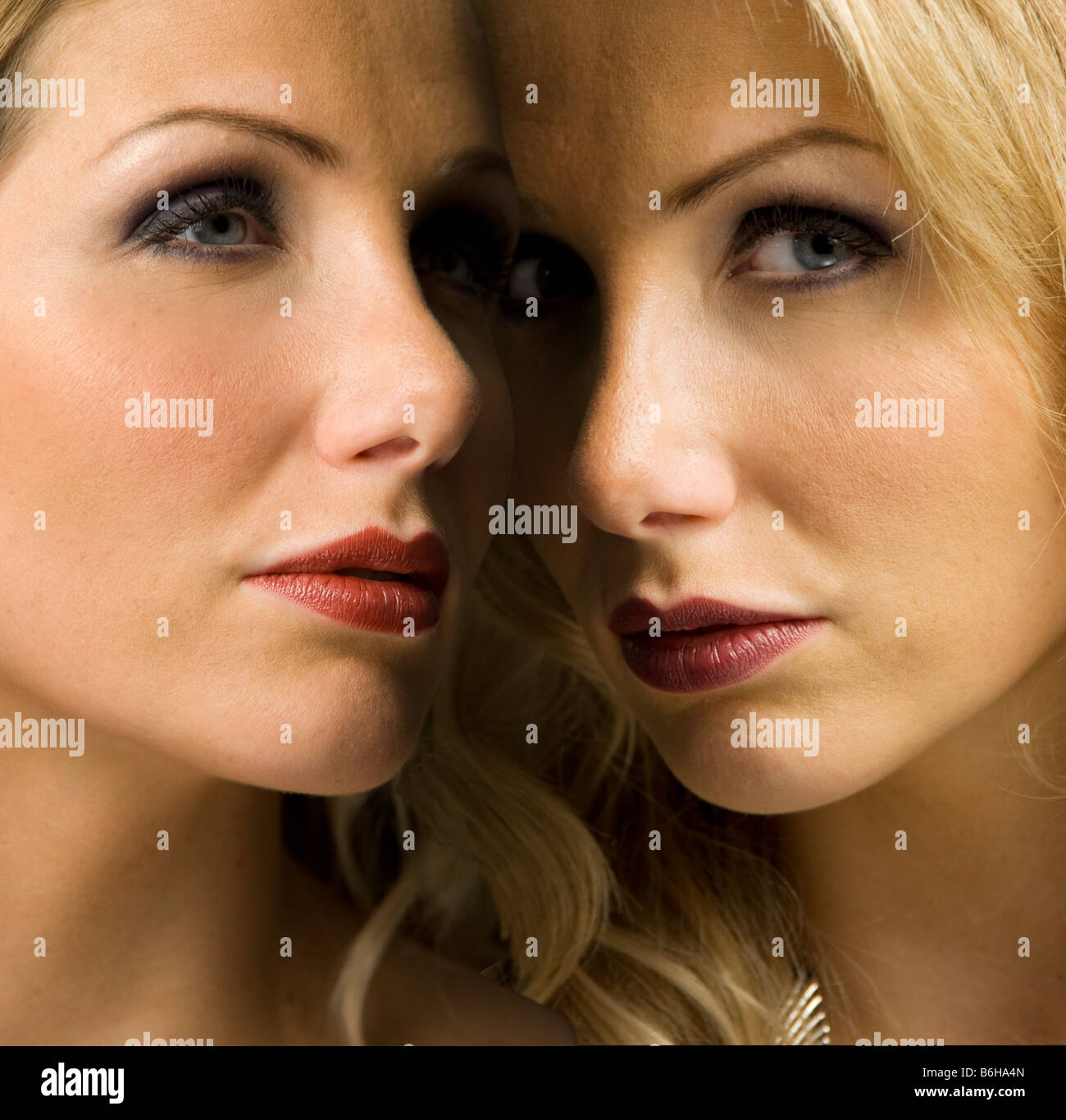 twins with heads together Stock Photo - Alamy