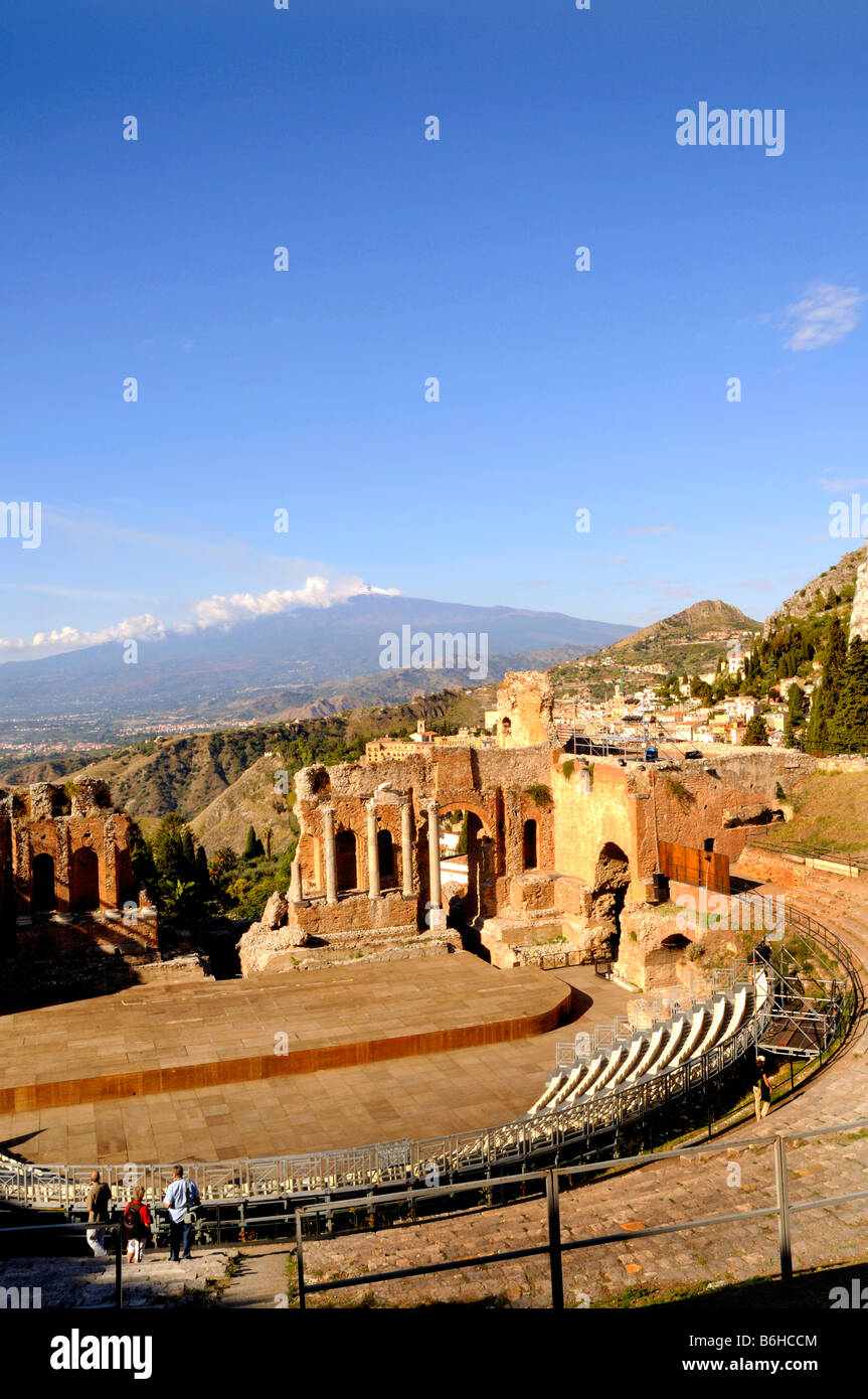 The Ancient Greek Theatre with Mount Etna behind in Taormina in Sicily ...