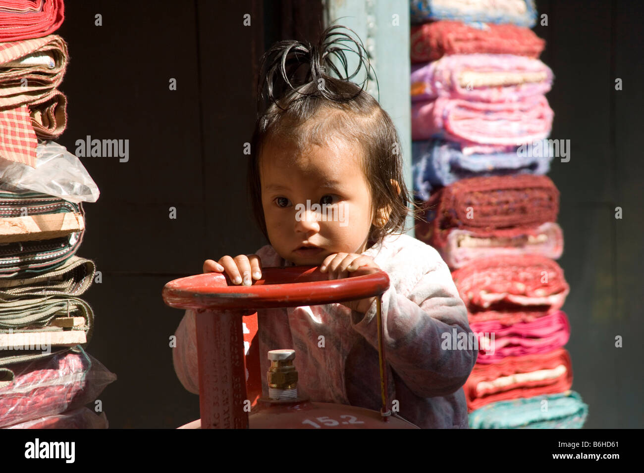 Nepalese girl with baby hi-res stock photography and images - Alamy
