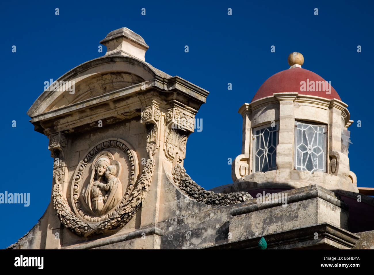 The elegant motif and lantern at a medieval chapel in Zejtun, Malta ...