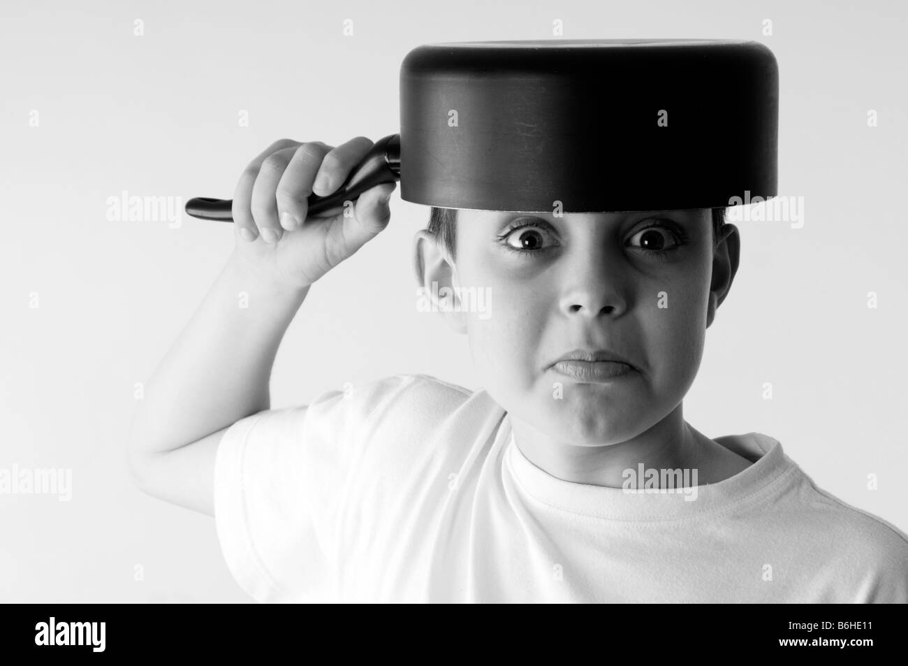 funny silly boy child messing about fun happy saucepan on head sauce ...