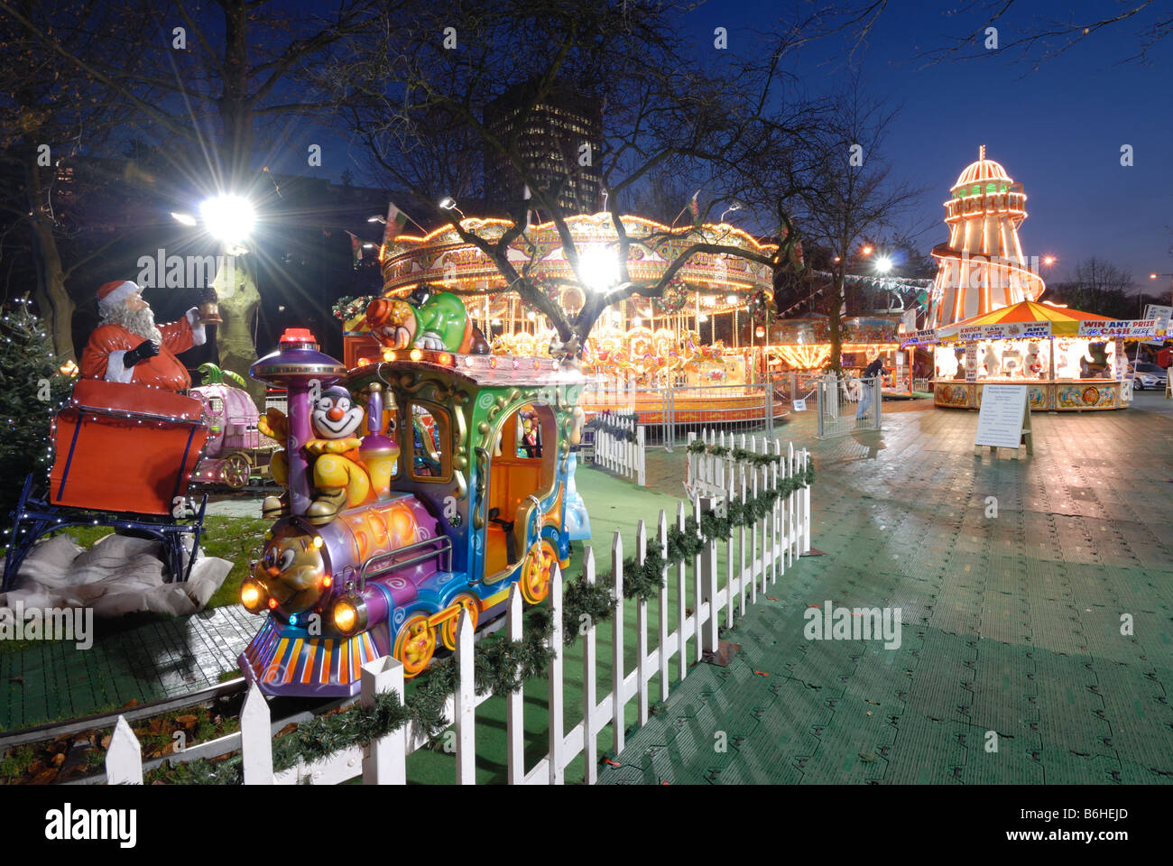 Cardiff Winter Wonderland's carousels and funfair Stock Photo - Alamy