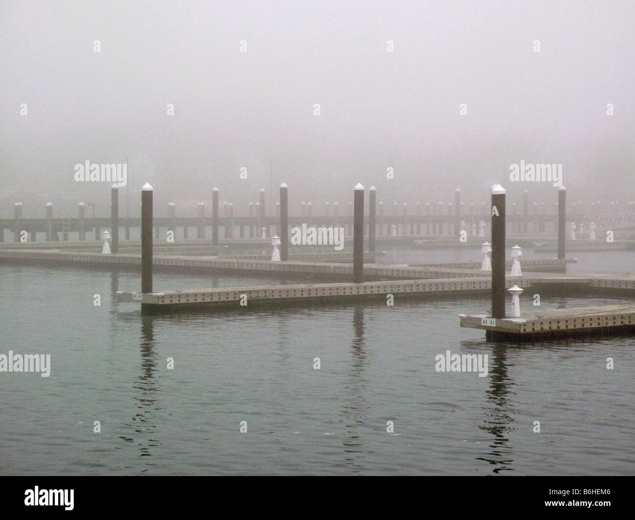 empty docks fog greenport new york nautical water harbor mist Stock ...