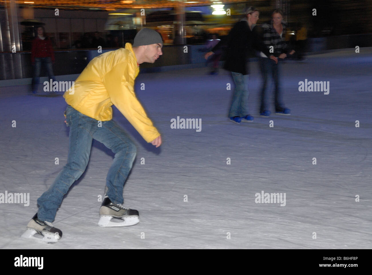 Safety Steward skating on the Cardiff Winter Wonderland ice rink Stock ...