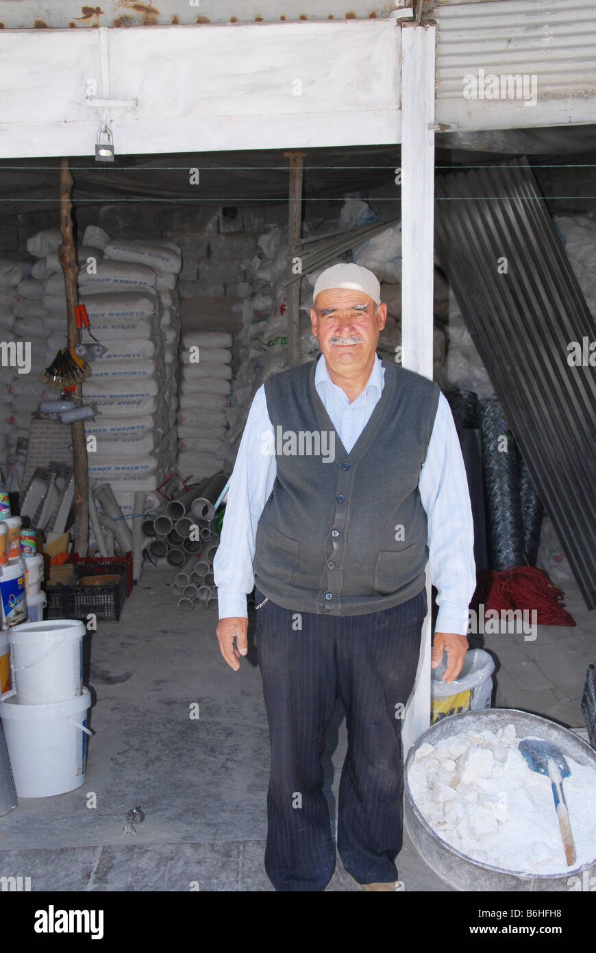Shopkeeper outside shop hi-res stock photography and images - Alamy