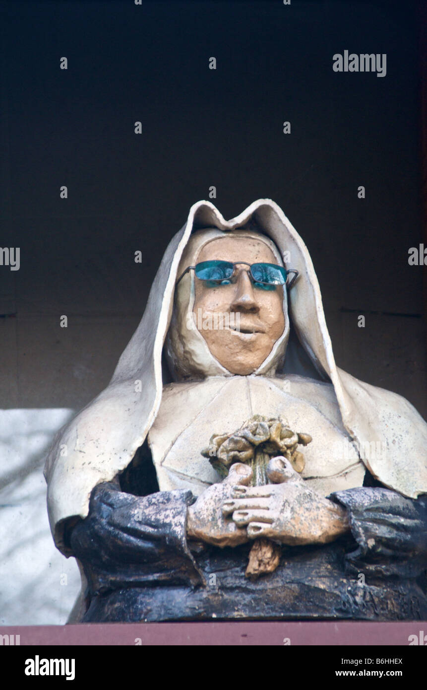 A Beguine statue at the Minnewater in Bruges, Belgium Stock Photo - Alamy