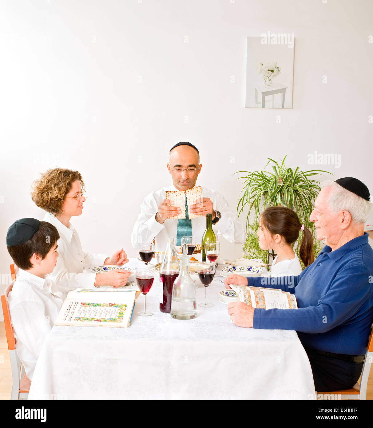 jewish family in seder celebrating passover Stock Photo - Alamy
