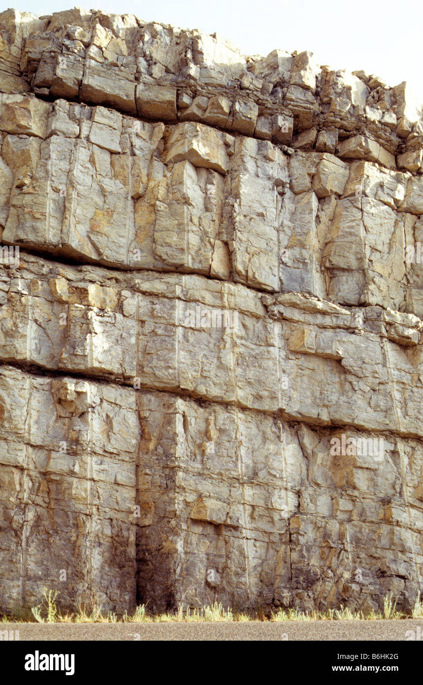Rock strata is exposed by cut made for highway Stock Photo - Alamy