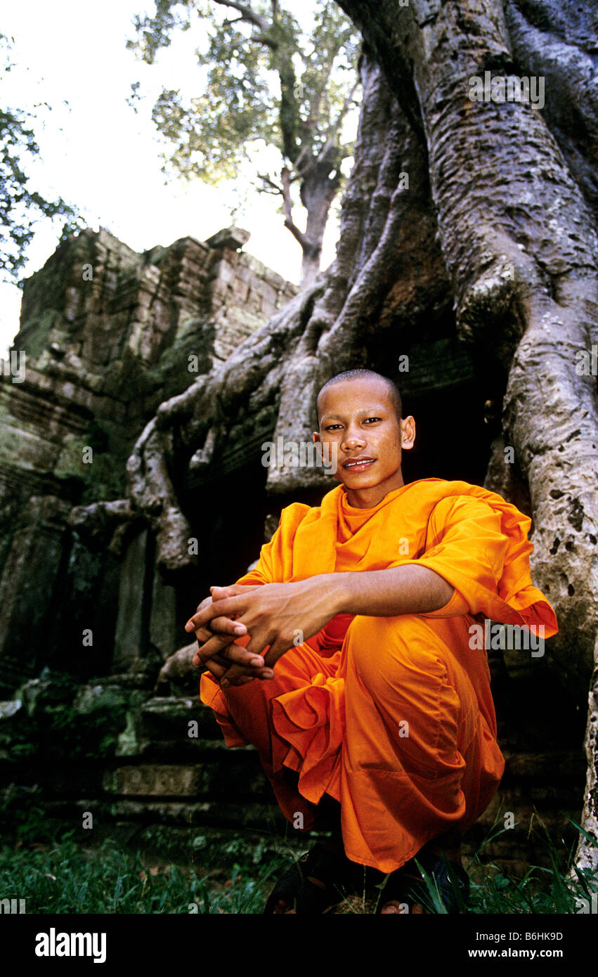 Novice monk in saffron robes at the unrstored 12th century temple of ...