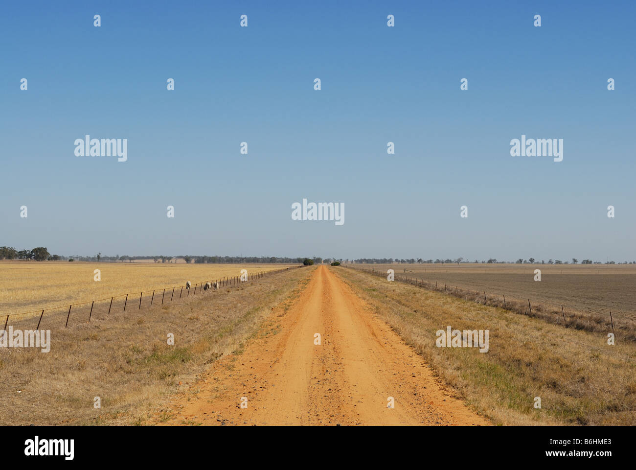 A lonely road seemingly leads to nowhere in drought ravaged outback ...