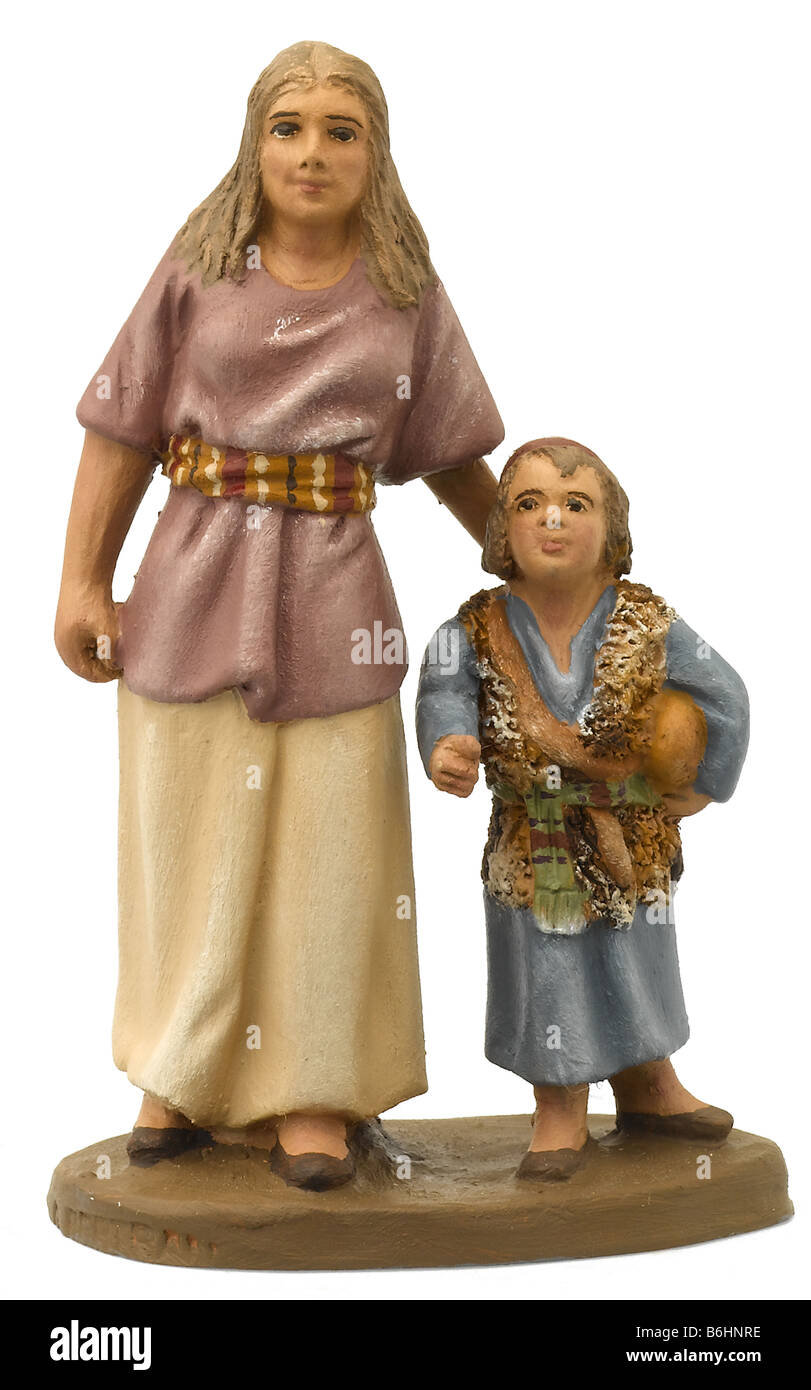 Nativity figures Woman and children Stock Photo - Alamy