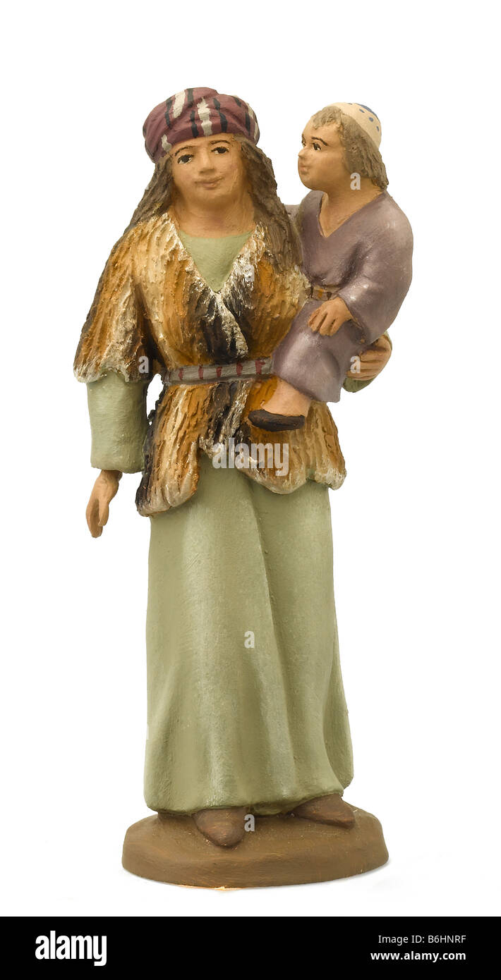 Nativity figures Woman and children Stock Photo - Alamy