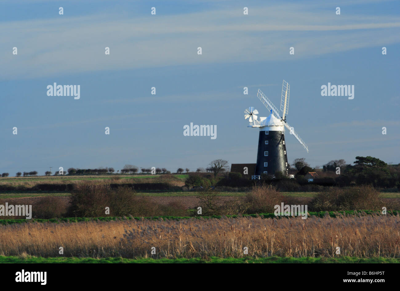 Windmill at Burnham Overy, overlooking marshes on the North Norfolk ...