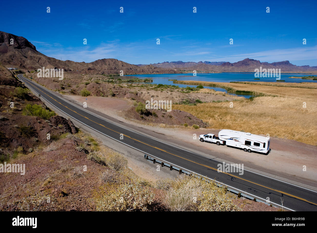 Fifth-Wheel RV and pickup truck parked by the side of the Highway 95 ...