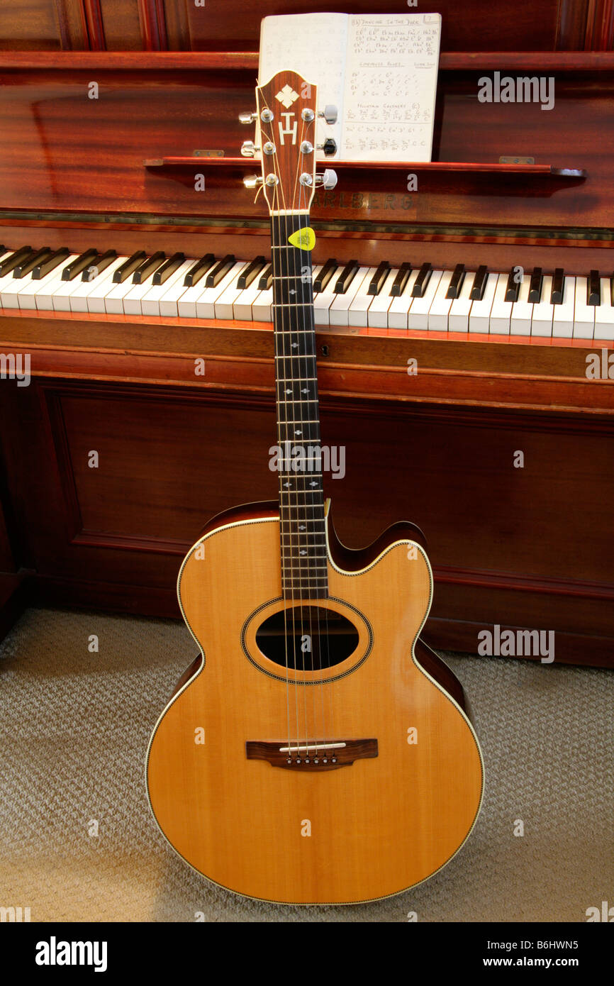 Individually designed flat top acoustic guitar with oval sound hole and ...