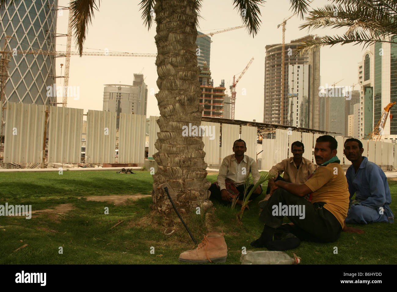 Migrant construction workers in Doha, Qatar Stock Photo - Alamy