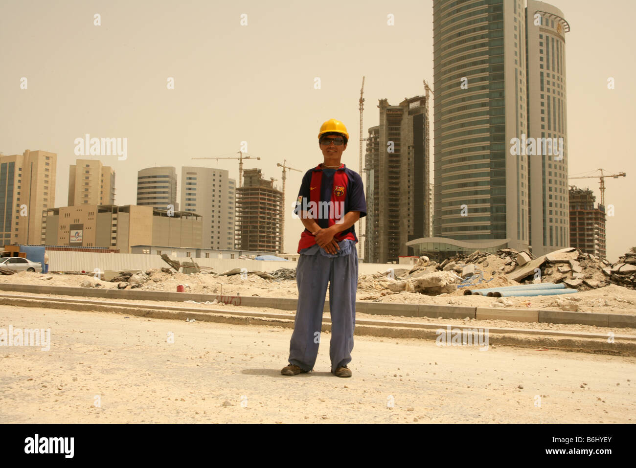 Migrant construction worker at a building site in Doha, Qatar Stock ...