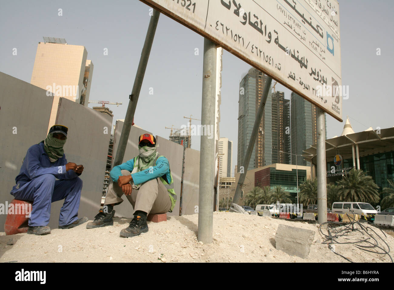 Migrant construction workers in downtown Doha, Qatar Stock Photo - Alamy