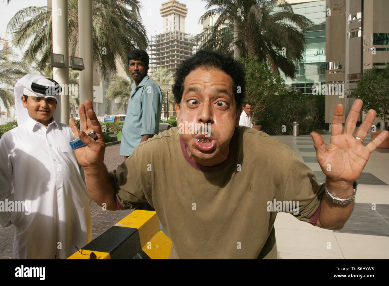 Man making funny face, Doha, Qatar Stock Photo - Alamy