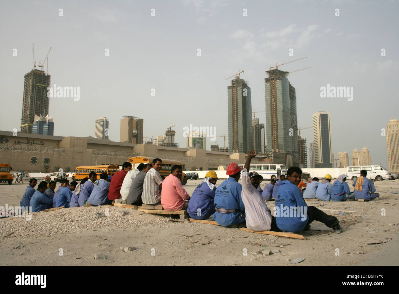 Migrant construction workers in downtown Doha, Qatar Stock Photo - Alamy