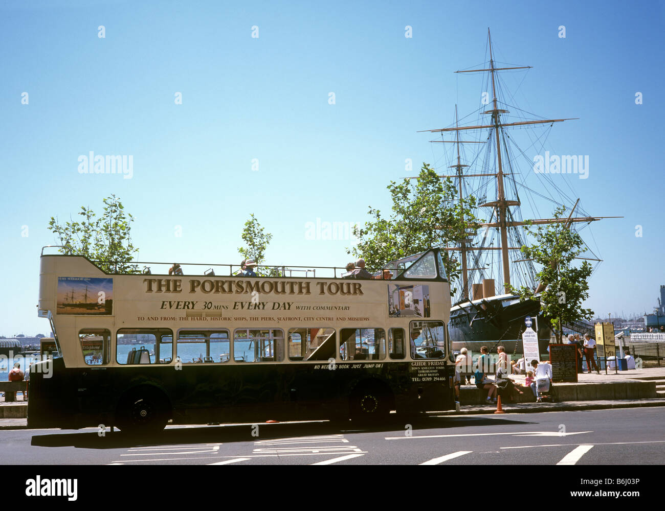 UK England Hampshire Portsmouth open topped sightseeing bus stop at HMS ...