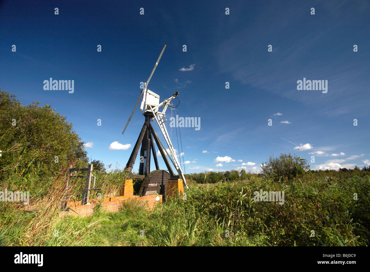 Clayrack open frammed Timber Windmill on the Norfolk Broads Stock Photo ...